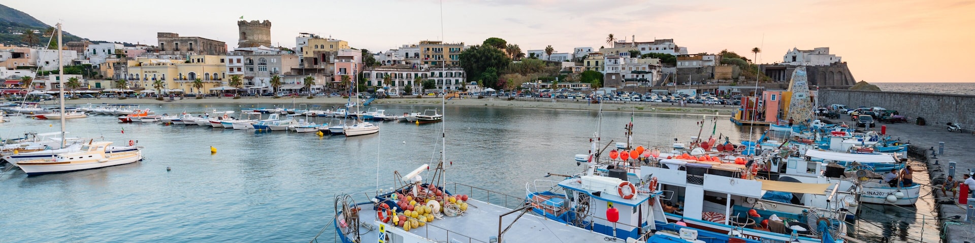 Port of Forio showing a bay or harbor, general coastal views and a sunset