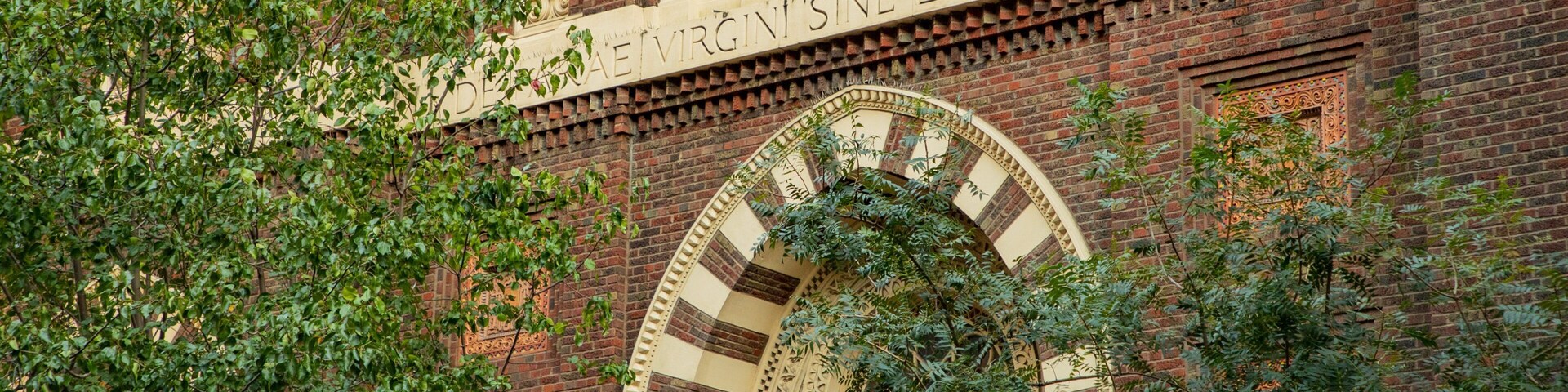 Immaculate Conception Church featuring heritage elements and signage