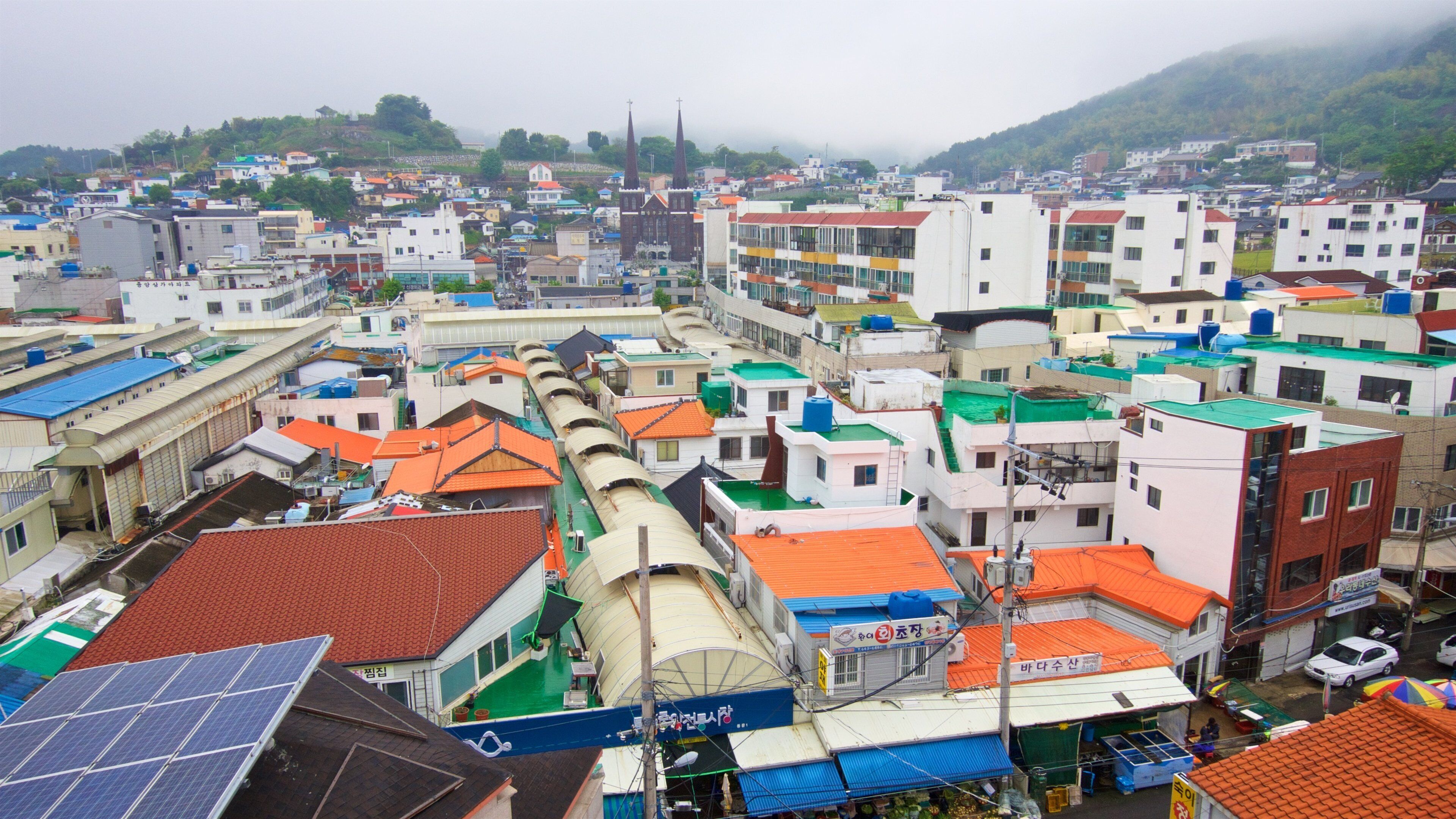 Dongpirang Wall Painting Village featuring a city and landscape views