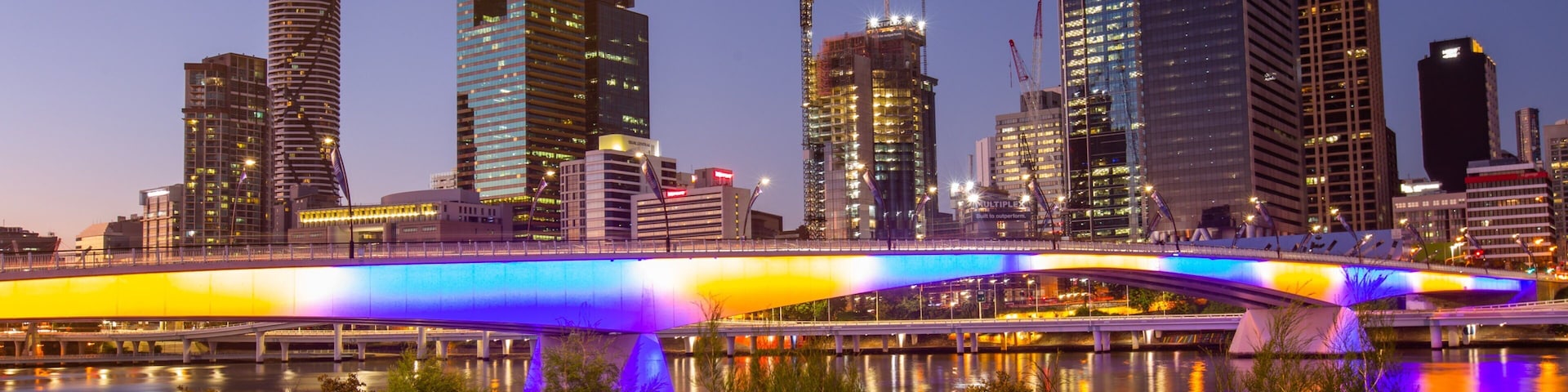 South Bank Parklands showing a bridge, a city and night scenes