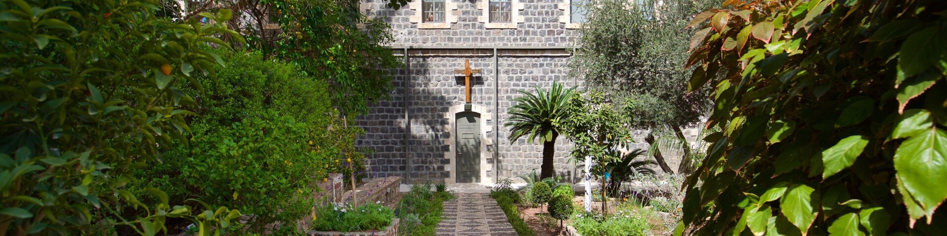 St. Andrew’s Church of Scotland, Tiberias featuring a garden and a church or cathedral