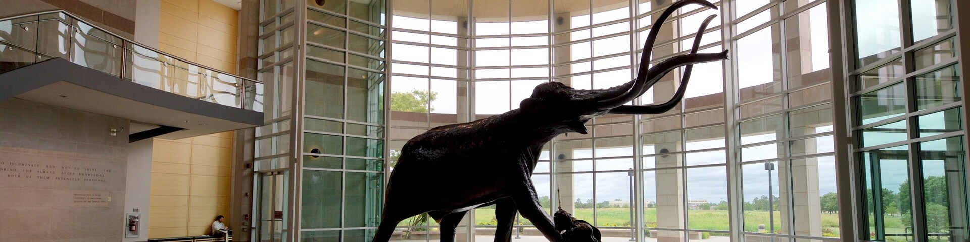 Sam Noble Oklahoma Museum of Natural History which includes a statue or sculpture and interior views