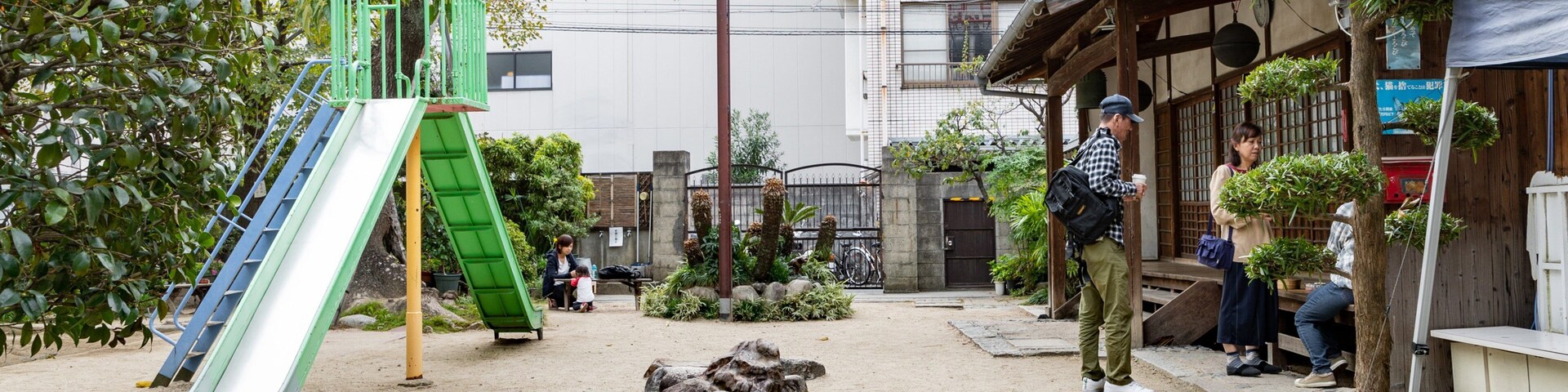 Enkoji Temple featuring a playground as well as a family
