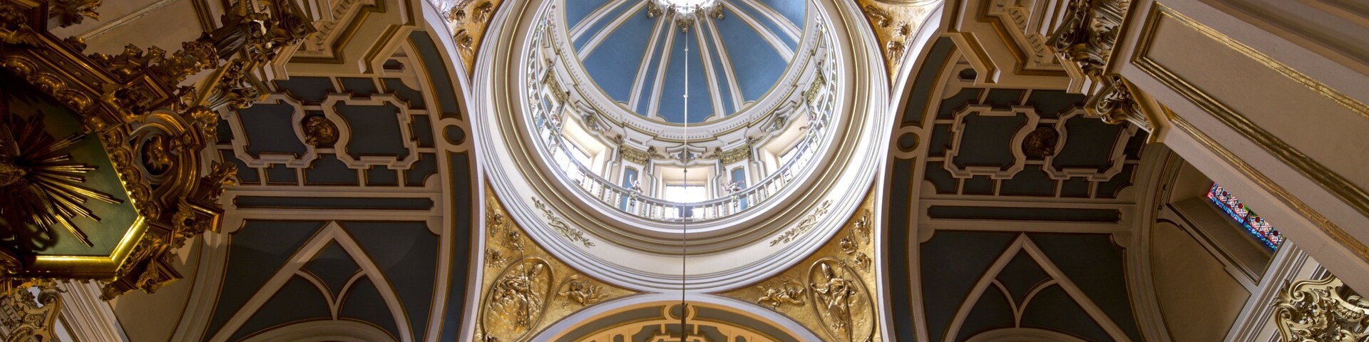 Church of San Saturnino featuring heritage elements and interior views