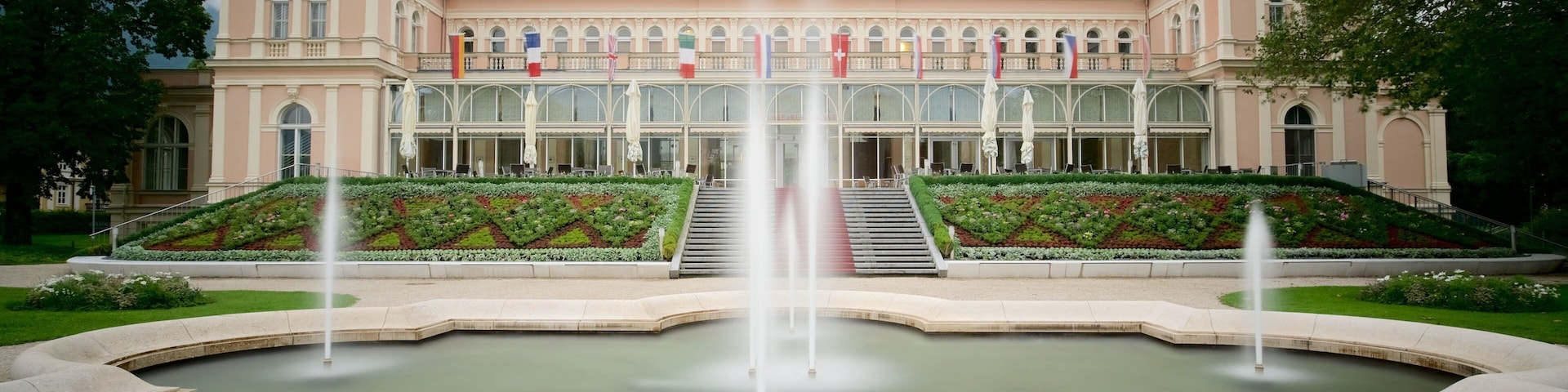 Bad Ischl which includes a garden, a fountain and heritage architecture