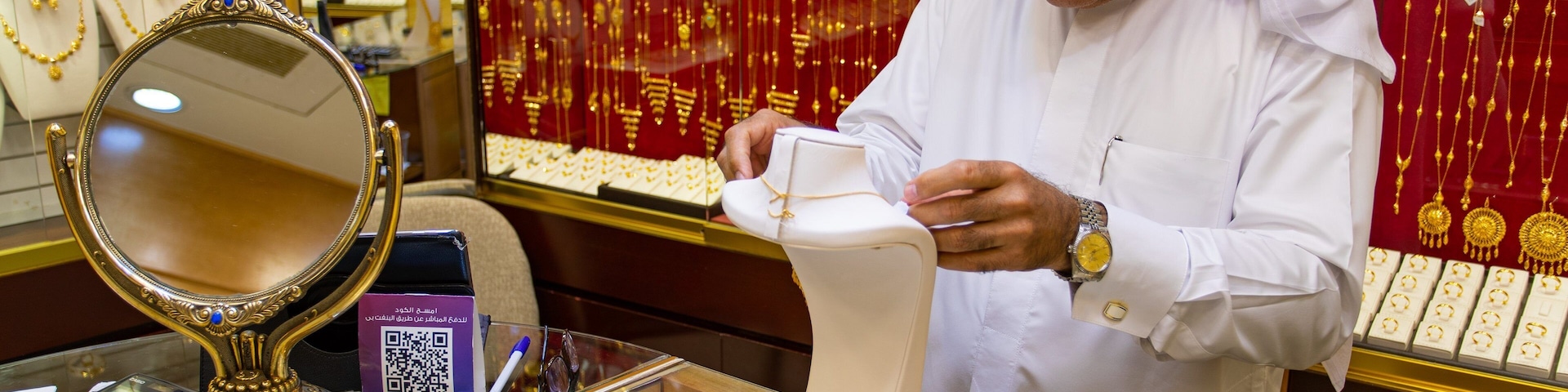 Gold Souq showing shopping and interior views as well as an individual male