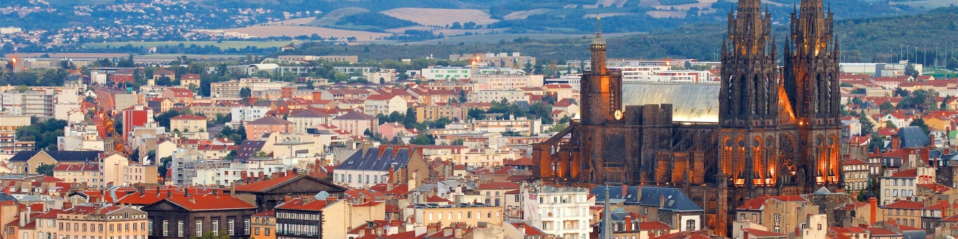 Montjuzet Park showing a church or cathedral, a city and heritage architecture