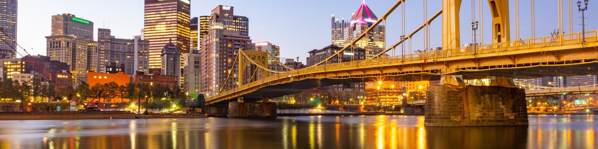 Andy Warhol Bridge featuring a river or creek, a city and a sunset