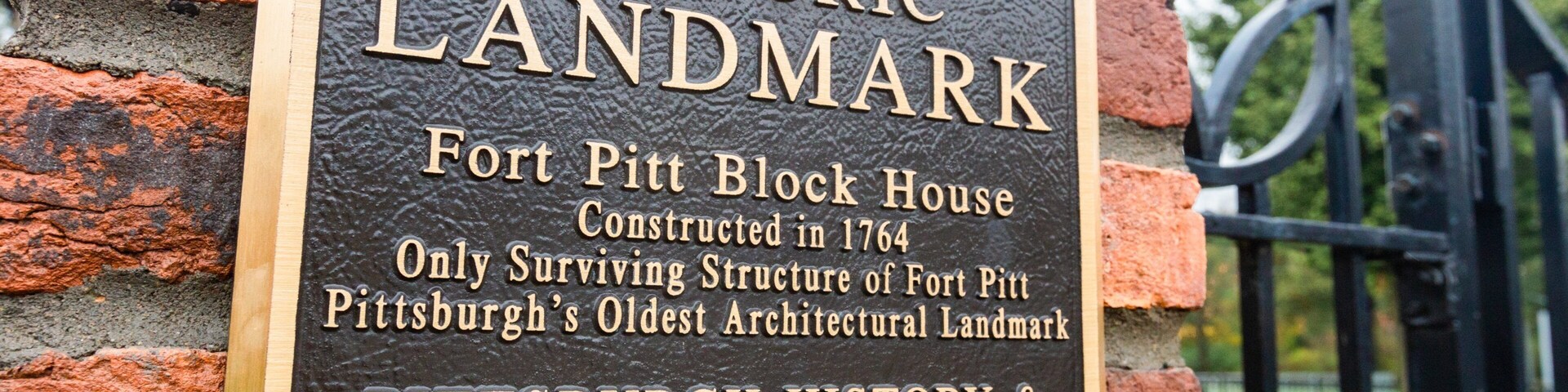 Fort Pitt Block House featuring signage and heritage elements