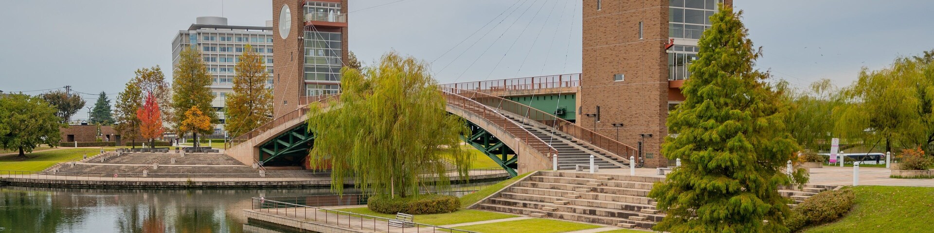 Tomi Canal Kansui Park which includes a park and a pond