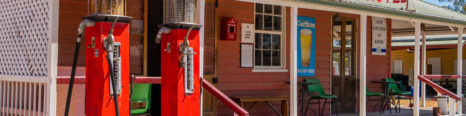Calliope River Historical Village showing a small town or village, signage and heritage elements