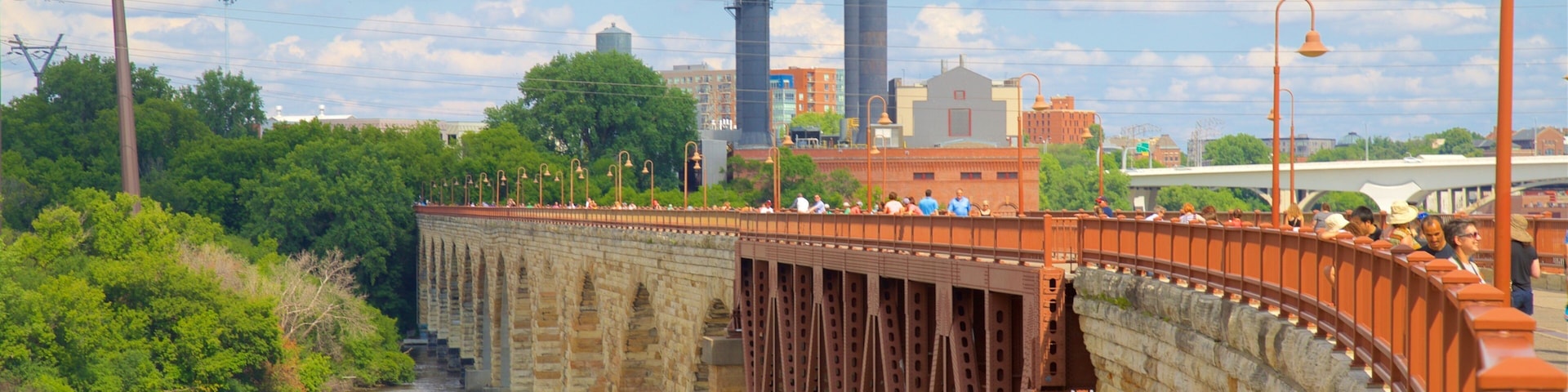 Stone Arch Bridge featuring a bridge and a river or creek