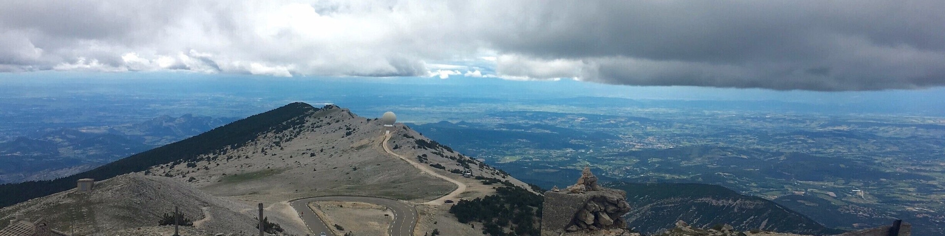 Located in Provence, Mont Ventoux is one of the most famous climbs used in the Tour de France. With a summit at 1911m above sea level it also offers an epic challenge to any cyclist. There are three routes to the top: from Bedoin, from Sault or from Malaucene.
The famous 'moonscape' opens out approximately 6km from the summit, the wind and lack of protection making for some tough riding conditions . Although a summit selfie is obligatory after such an epic achievement, this view gives a distinct sense of how far you've come. The wagon selling cookies and treats at the height of the season is an added bonus!