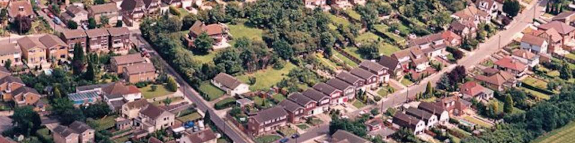 Aerial view of Underhill Road estate, South Benfleet. This is a closer view of the new estate seen in 572876. Underhill Road runs from the lower left towards the upper right. Thundersley Glen is to the top right, and Boyce Hill golf course to the bottom right.