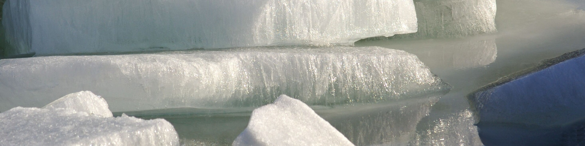 During a spring thaw the ice started to break up on the Detroit river. The river has a strong current which caused this pile up as the pieces started to shift. I liked the sun on the ice, the texture of the ice and the reflections.