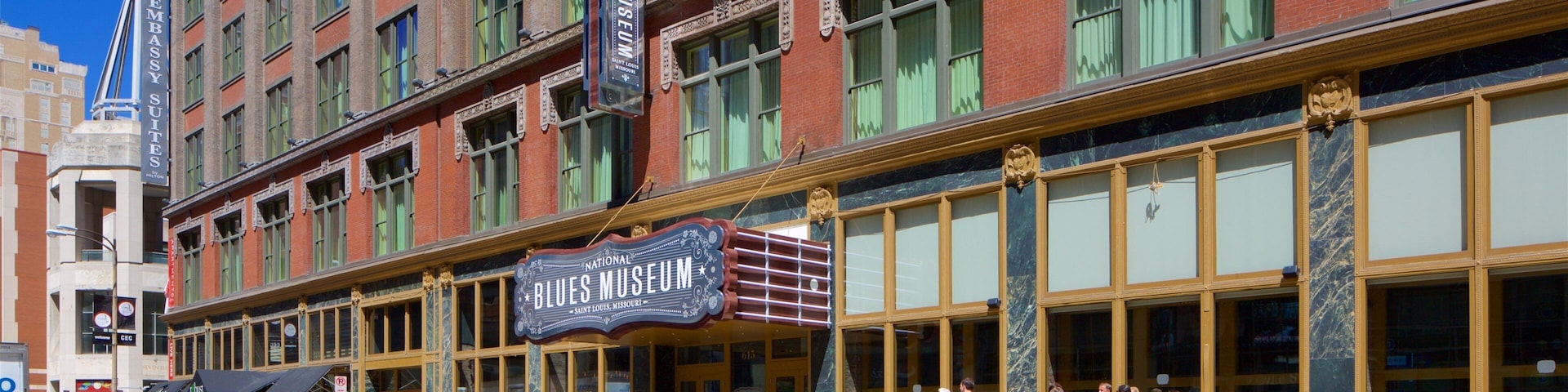 National Blues Museum featuring signage and street scenes