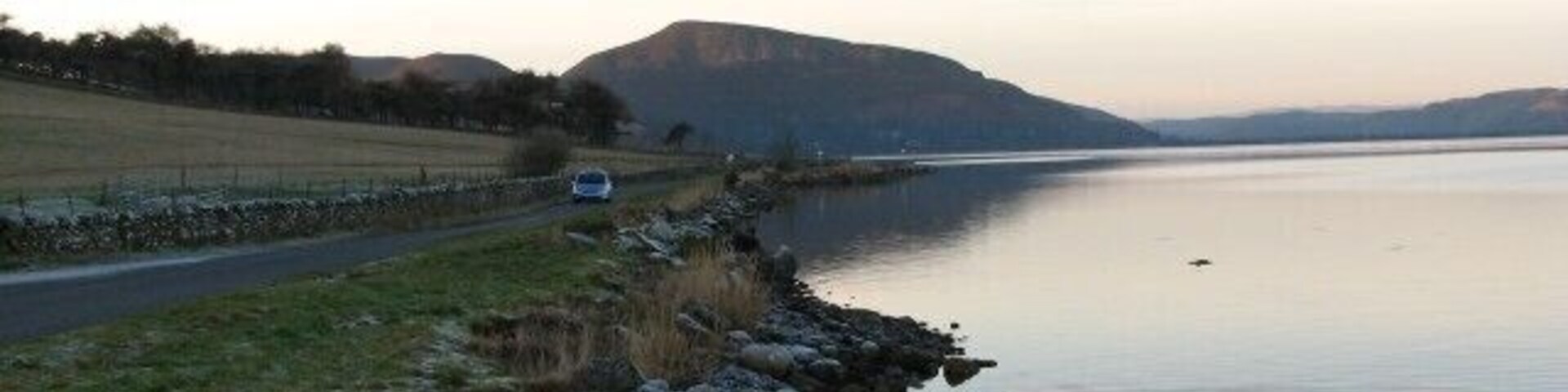 Loch Fleet. Looking west along the south shore of Loch Fleet to Creag an Amalaidh.