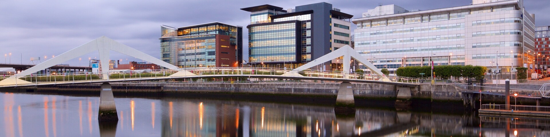 Glasgow which includes night scenes, a bridge and a river or creek
