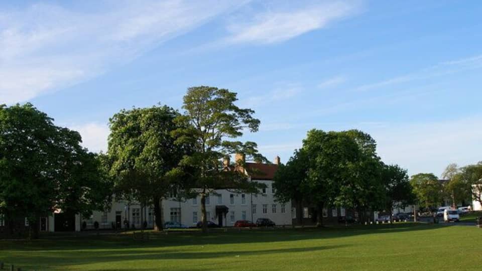 Norton Hall from across Norton Green Norton Hall is now converted into wonderful apartments- imagine having the ballroom as part of your flat! Before this the building was used by ICI to wine and dine guests.