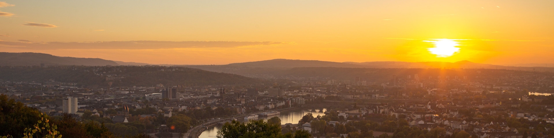 St Maarten and St Martin showing a city, landscape views and a sunset