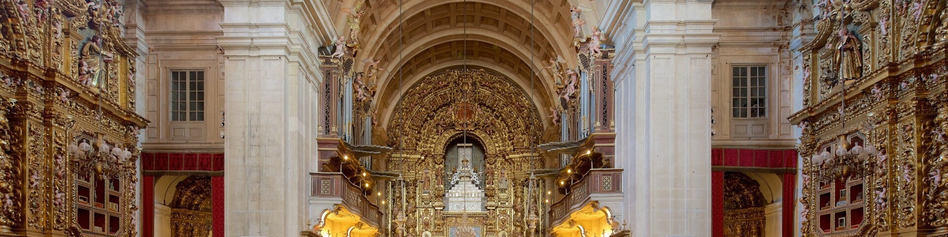 Coimbra showing a church or cathedral, heritage elements and interior views