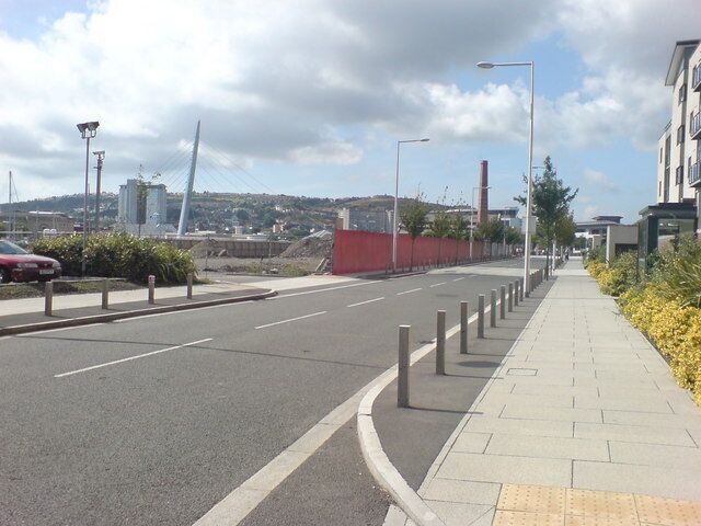 SA1 Development The new SA1 development takes shape.The chimney stack is being incorporated into the new design - a fluid mix of old and new. Very nice. Town Hill looks down on ever changing Swansea.
