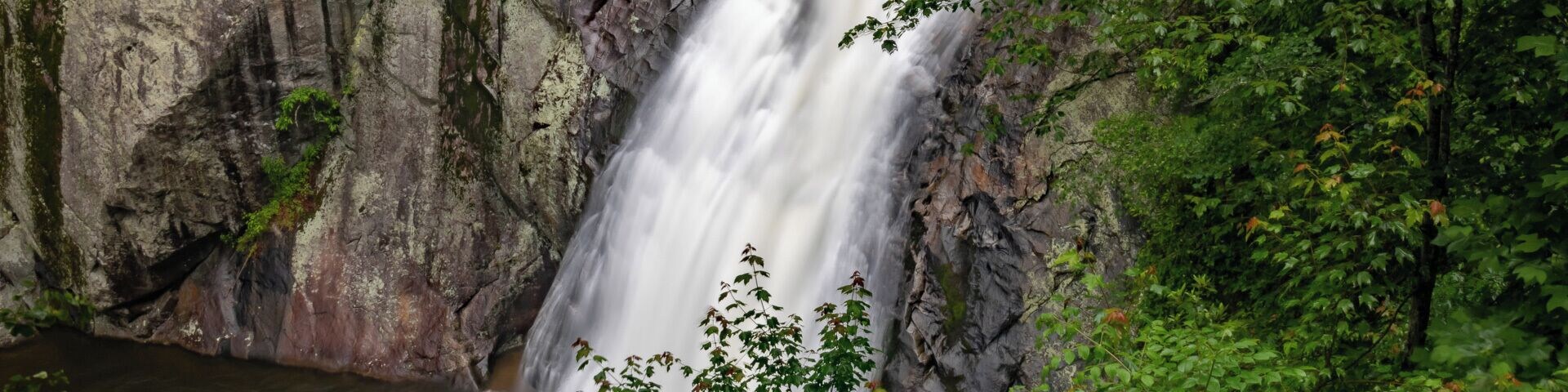 A nice waterfall in the Wilson Creek area of the Pisgah National Forest. After a good rainfall this waterfall really puts on a good show. It also has a popular swimming hole just below the falls but it is very steep getting down to the creek. For a video of the hike to this waterfall, please visit: https://www.hdcarolina.com/episode/harper-creek-falls