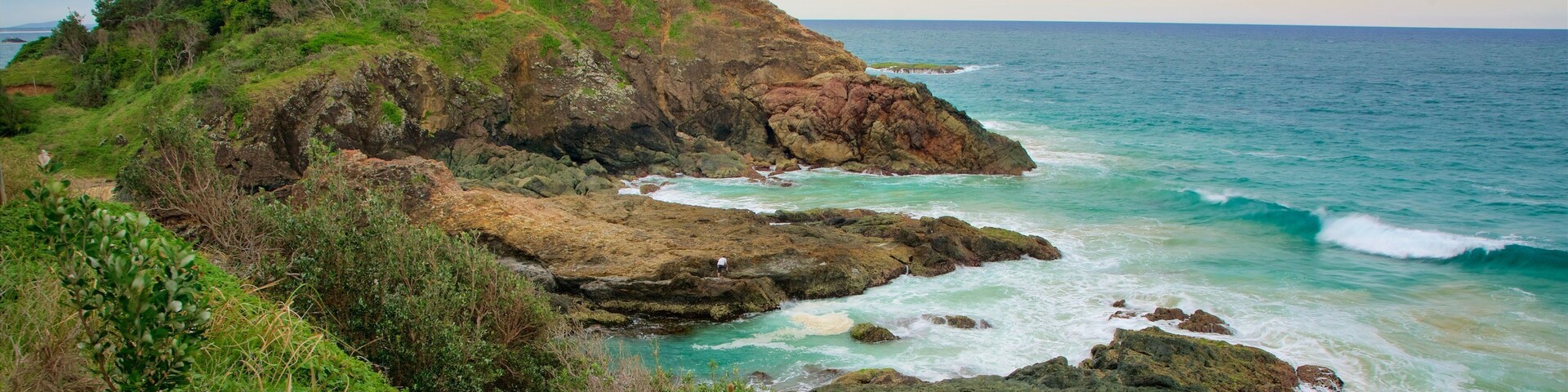 Nobbys Beach featuring rugged coastline, landscape views and general coastal views