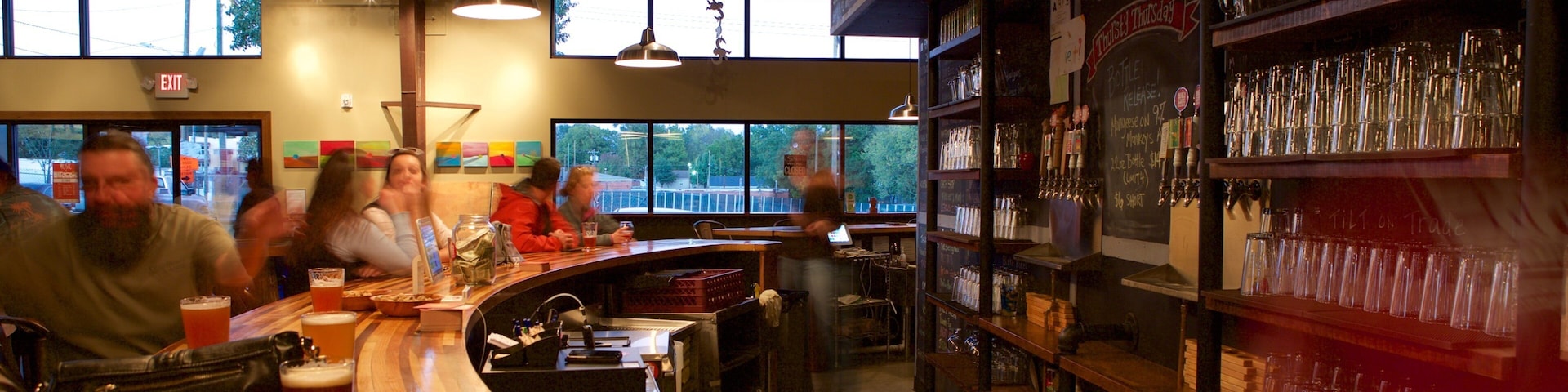 Charlotte featuring interior views as well as a small group of people