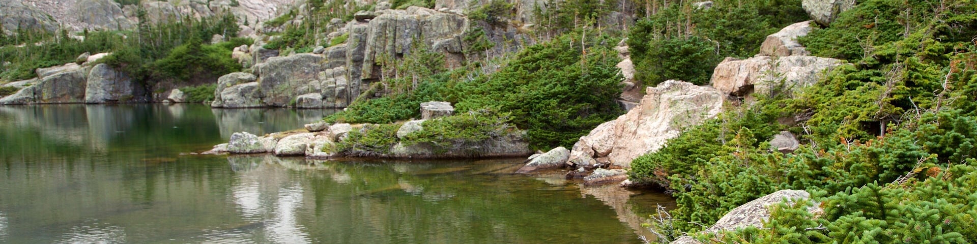 North Central Colorado featuring a lake or waterhole