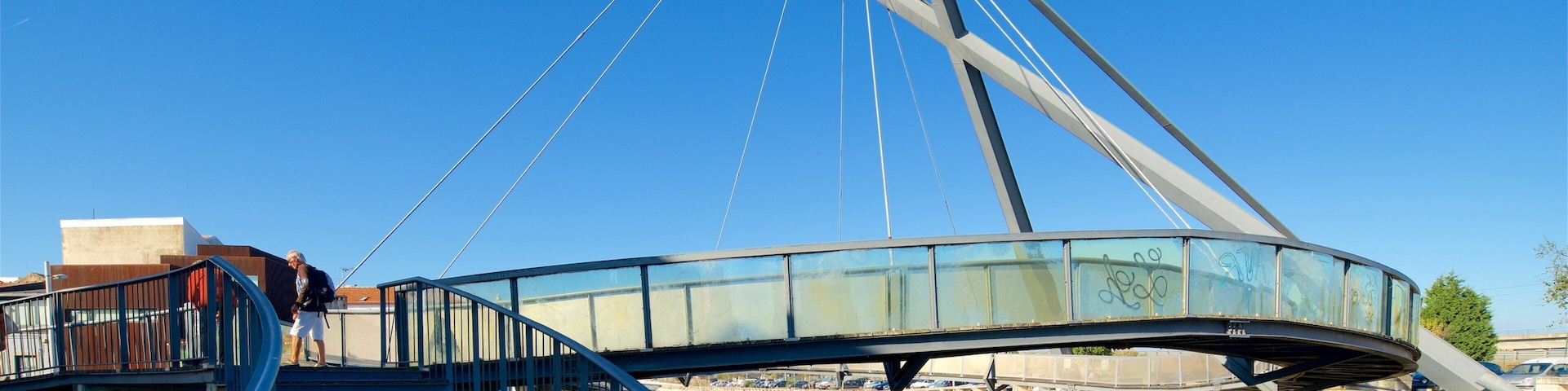Circular Pedestrian Bridge showing a bridge and a river or creek