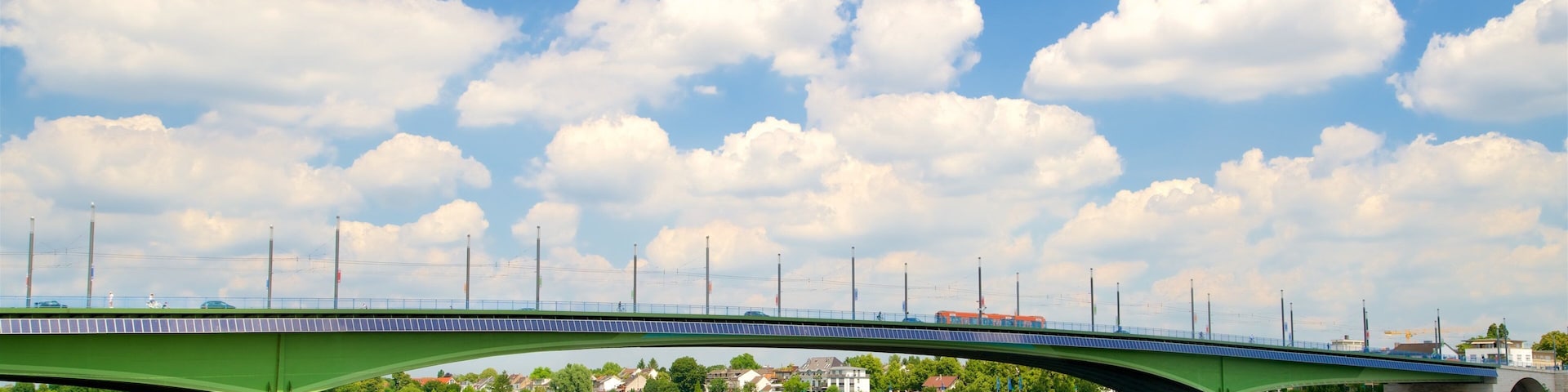 Kennedy Bridge featuring a bridge and a river or creek