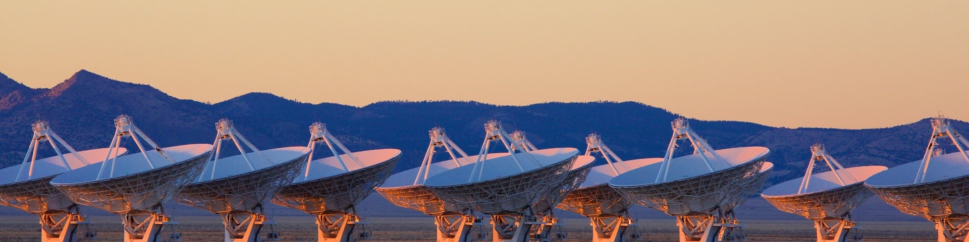 NRAO Very Large Array which includes tranquil scenes, an observatory and a sunset