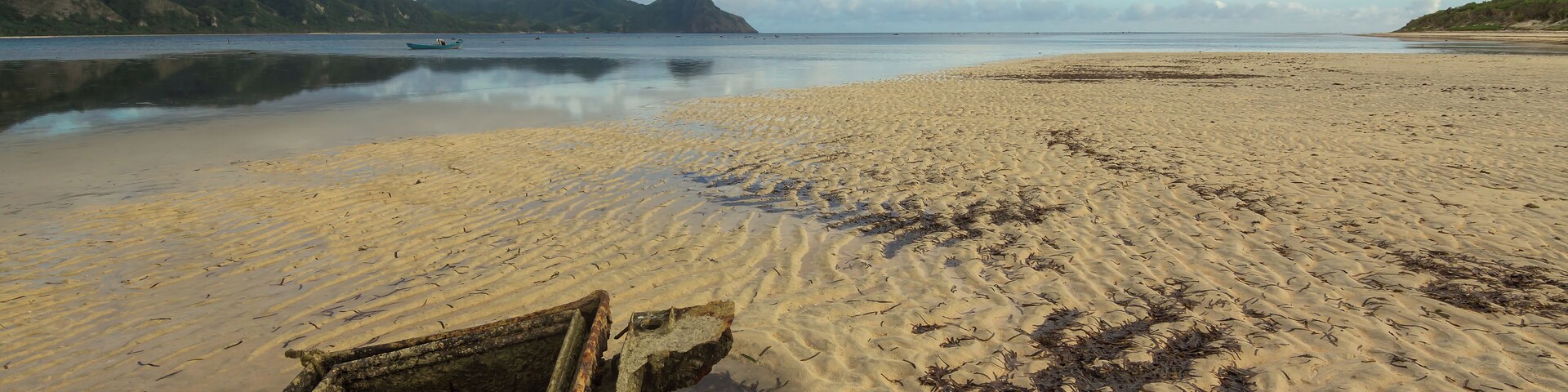A short ride aboard the tataya (a small fishing boat without outriggers) across the sea and west of the small village of Nakanmuan in Sabtang found me in the uninhabited island of Ivujus/Vohas. There are no communities or residents here as it has been made a grazing island for cows. Aside from the bovine residents and the lush vegetation, the fine sandy beach is dotted with pieces of wreckage from old ships. In the photo, you can see the island of Sabtang from afar.
#Asia #Philippines #Batanes #travel #beach #island #adventure #nature #localsecrets