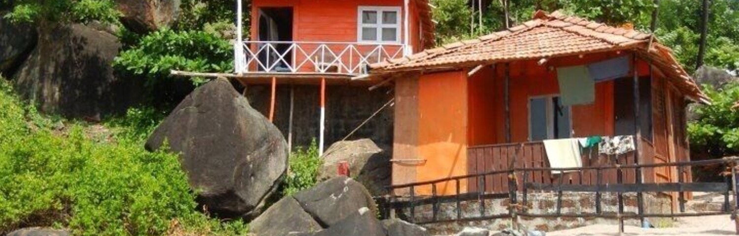Beach houses in a quiet corner of Palolem beach, Goa.