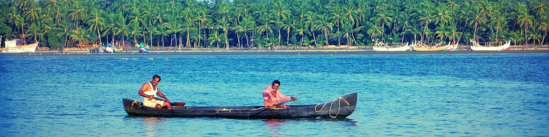 This place in north Kerala is very beautiful and calm. House boats are available in the Periyar river. Two fisherman singing and boating waved to me. Click !!