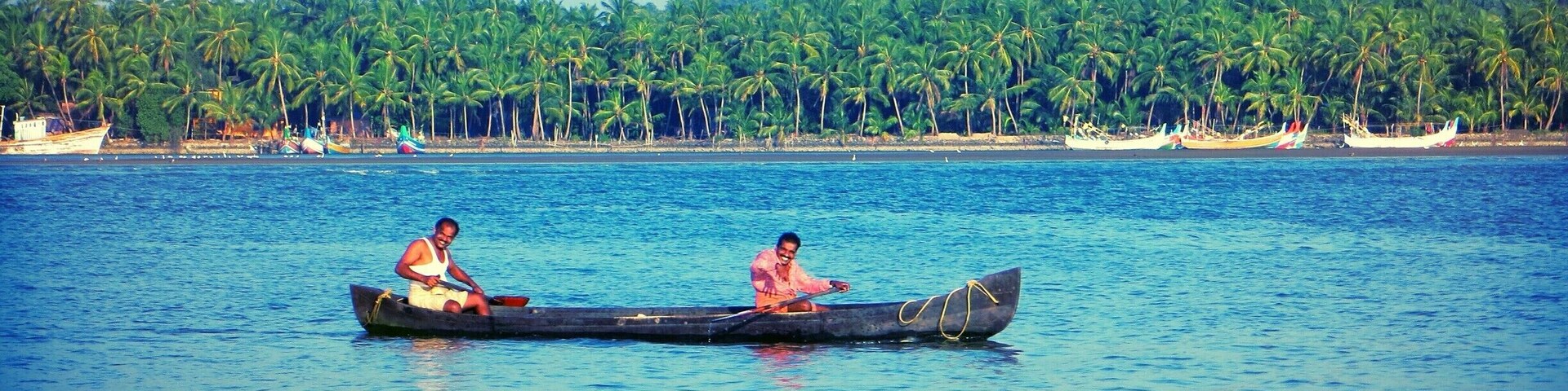 This place in north Kerala is very beautiful and calm. House boats are available in the Periyar river. Two fisherman singing and boating waved to me. Click !!