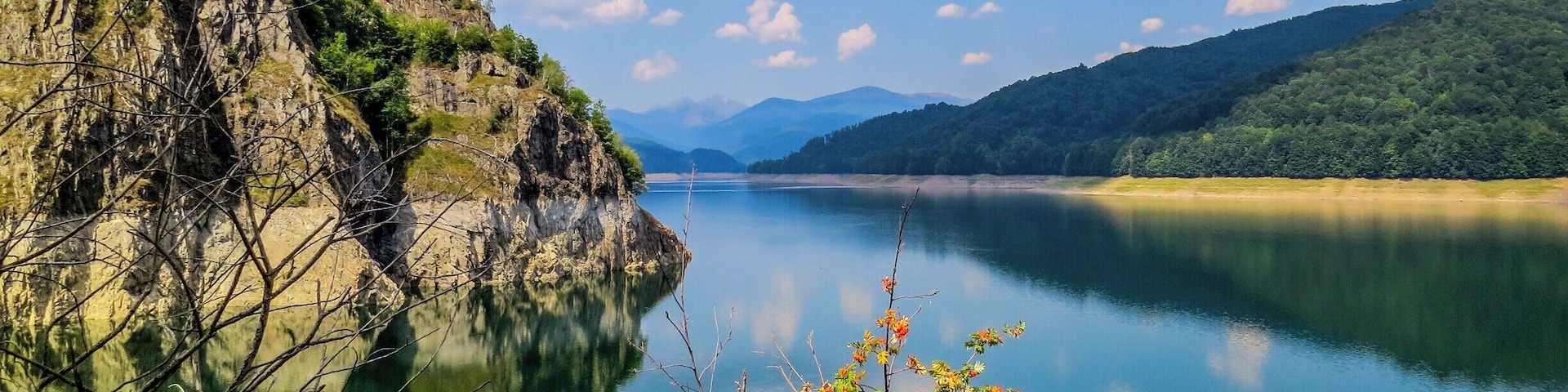 Beautiful artificial Lake Vidraru in Romenia. It was created in 1965 by the construction of the Vidraru Dam on the Arges River. Check out the natural mirror effect.