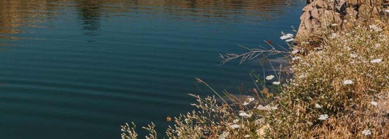 This lake, the only one of its kind in Romania, appeared in an old granite quarry. Its depth is about 20m and the blue waters cover the machinery abandonded after the quarry was no longer in use. It is close to Tulcea and Macin Mountains.