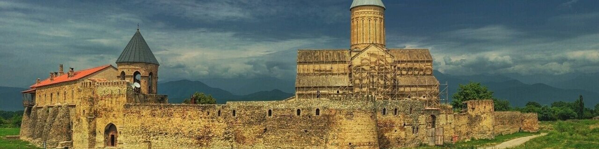 July 2010
Alaverdi monastery, Kakheti region, Georgia
Alaverdi Monastery is a Georgian Eastern Orthodox monastery located 25 km from Akhmeta, in the Kakheti region of Eastern Georgia. While parts of the monastery date back to 6th century, the present day cathedral was built in the 11th century by Kvirike III of Kakheti, replacing an older church of St. George.
The monastery was founded by the Assyrian monk Joseph (Yoseb, Amba) Alaverdeli, who came from Antioch and settled in Alaverdi, then a small village and former pagan religious center dedicated to the Moon. At a height of over 55 meters, Alaverdi Cathedral is the second tallest religious building in Georgia, after Holy Trinity Cathedral of Tbilisi, which was consecrated in 2004. Its overall size is also smaller than the cathedral of Svetitskhoveli in Mtskheta. The monastery is the focus of the annual religious celebration Alaverdoba. Situated in the heart of the world's oldest wine region, the monks also make their own wine, known as Alaverdi Monastery Cellar.