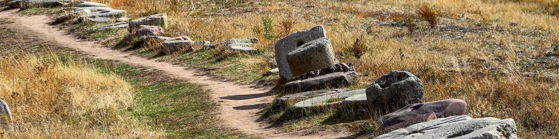 Burana Tower is one of the last remaining monuments at the ancient Silk Road city of Balasagun, located nearby the modern city of Tokmok in the Kyrgyz Republic (Kyrgyzstan). The tower site also features a small museum, an open-air museum with a collection of petroglyphs and “balbals” (akin to grave markers), and the hill that once was the royal palace. The views toward the mountains are spectacular on a clear day.