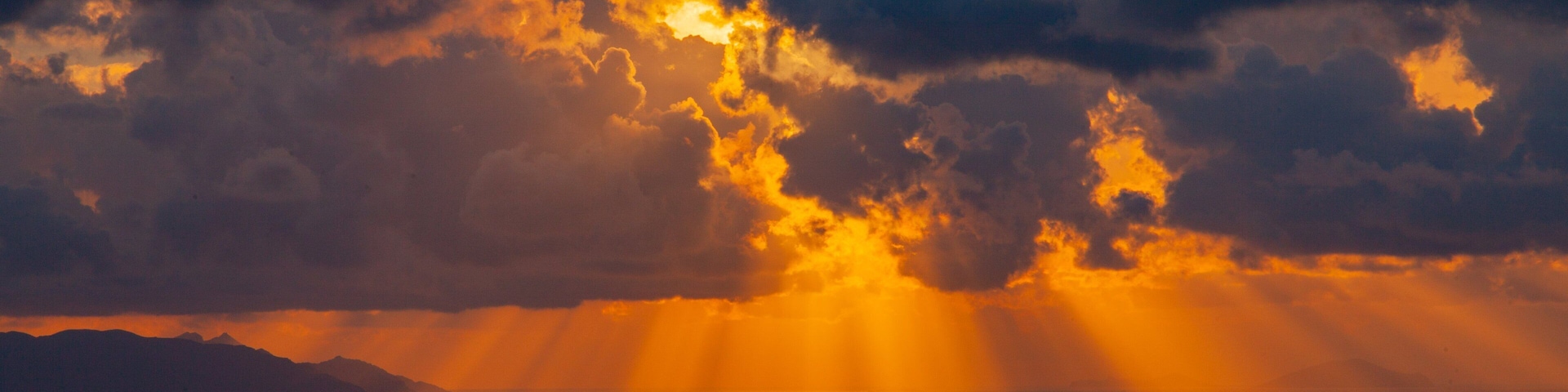 Santorini showing general coastal views and a sunset
