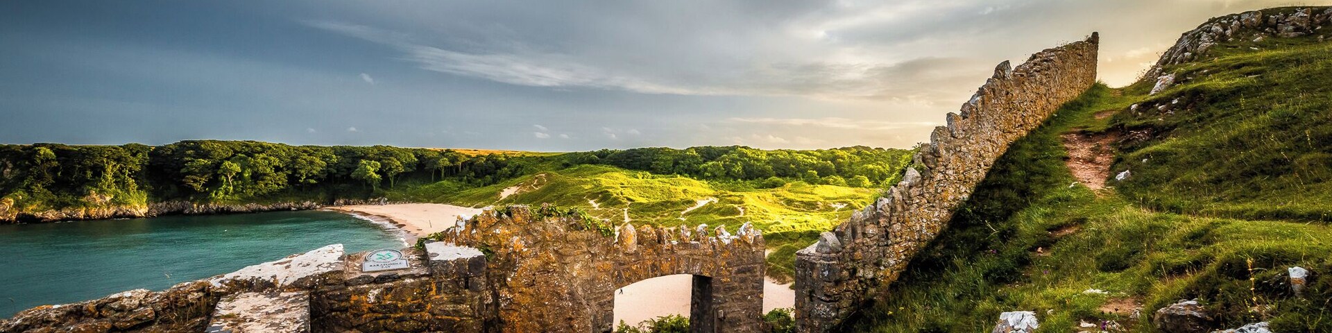 Barafundle Bay is a small bay backed by dunes and pine trees, accessible only by a half mile walk from the nearest car park. Swathes of golden sand and crystal clear waters, Barafundle has been voted many, many times as one of the best beaches in Britain and the world; it’s often likened to a Caribbean beach! This pristine beach is isolated which means no facilities; so everything you take has to come back up over the cliffs.
#instone #remotebeach #roadtrip #reflections #beach #wales #uk #seaside #sea #coast #coastal #pembrokeshire #britain #nature #sunset
Location
Nearest town: Stackpole Quay
County: Benfro / Pembrokeshire
Latitude/Longitude: 51.6175, -4.90087
Postcode: SA71 5LS
(postcode is for sat-nav purposes only, and may not represent the actual address of the beach)
Access
From the road between Stackpole and Freshwater East. take the turning to Stackpole Quay. Access to the bay is via a 1km path leading from the car park. then a steep cliff path.