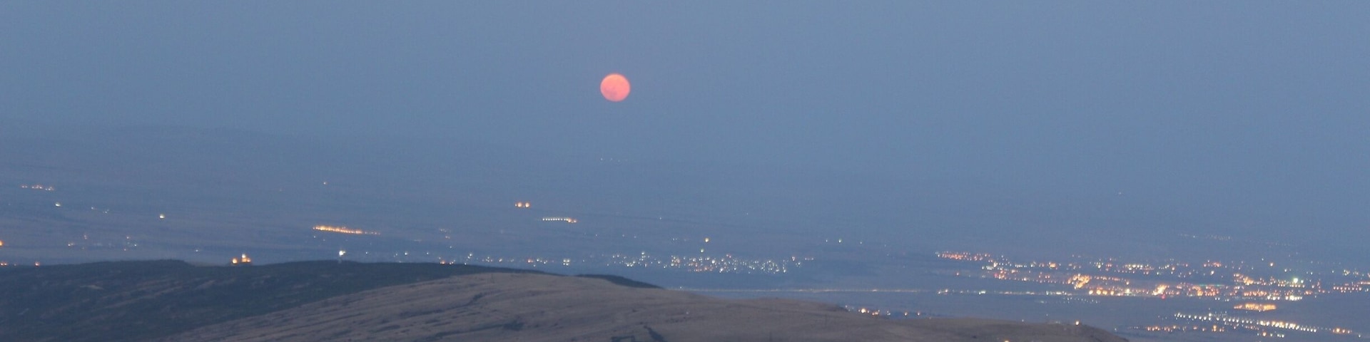 Moon rising over Tbilisi. View from a place called Kojori, Georgia.