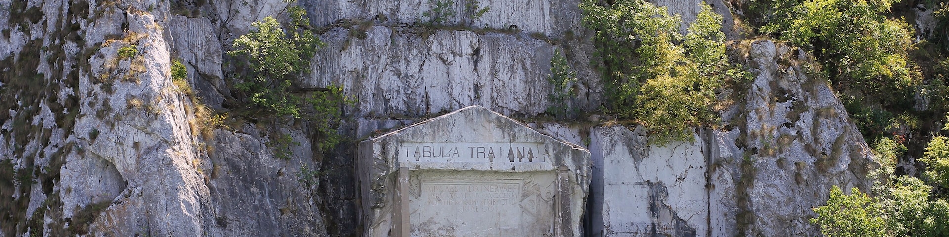 Tabula Traiana (Trajan’s Plaque) is the last remaining piece of evidence an ancient Roman bridge. The tablet features Latin inscriptions telling of Trajan’s bridge; the longest bridge in the world for 1,000 years following its construction. Emperor Trajan completed the road across the Danube leading into Dacia. The bridge was 1,097 m long and 20 column supported the architectural masterpiece.
In 1969, because of the Djerdap Project, building a dam over Danube river, Trajan's carvings with the inscription / Trajan's Plaque was protected from sinking by raising it by 20/25 m. It was placed just above the original location, cutting and fixing the entire block of the old bearing - a stone monolith together with the inscription and part of the road, about 300 tons in weight.
#InStone
#History Photo Contest
#Serbia
#Romania
#Danube