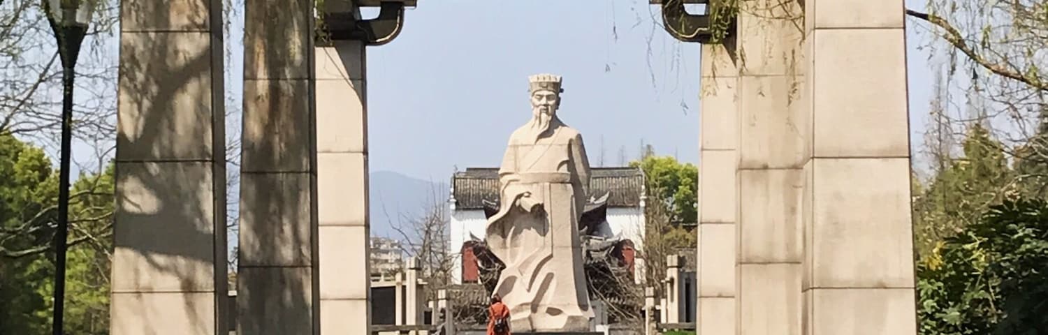 A lovely day at the park across from ancient street