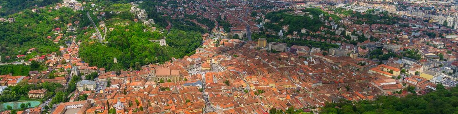 I used Brasov as my headquarters during my Romanian excursions.
Learn why: http://www.alwayswanderlust.com/skip-bucharest-go-to-brasov/