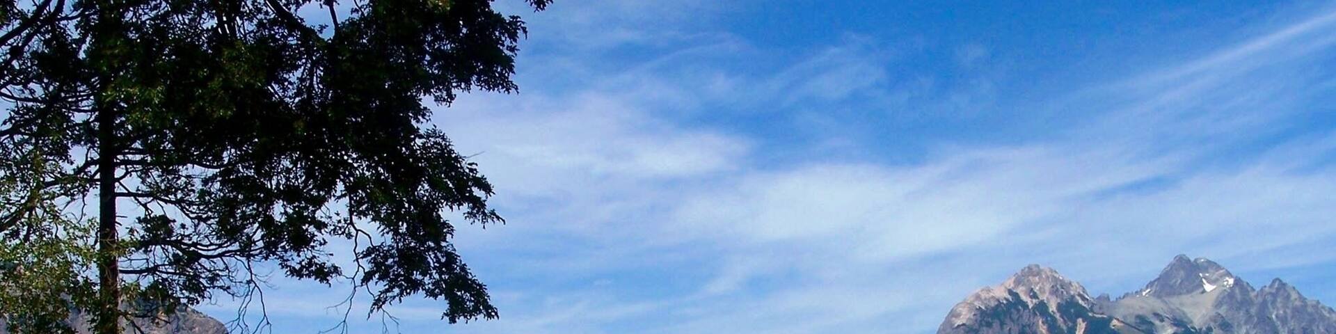 I do believe I could have sat in this spot for days and never tired of the view!! This photo looks more like a painting than the one from Yellowstone. They are both incredible places to take a picture.