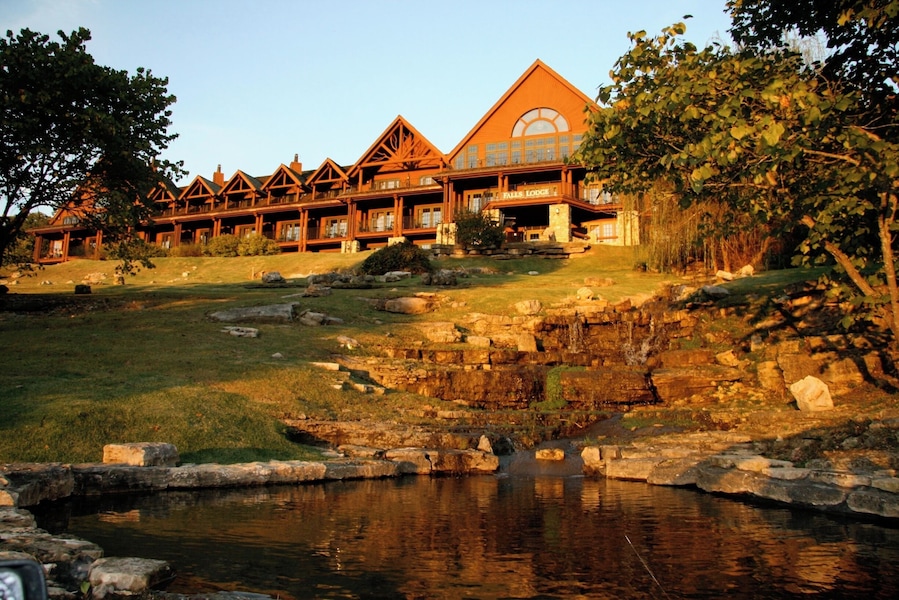 Falls Lodge as the sunsets. One of the 3 buildings with "hotel" accommodations at Big Cedar Lodge in additions to the cabins. Falls Lodge has rooms featuring two double beds and king bed rooms that feature gas fireplaces. The views are of the ground and Table Rock Lake are beautiful and the lobby is a mic enlace to relax with some wine and enjoy one of the two gas fire places.
