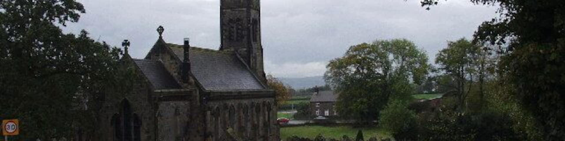 St John The Baptist at Penymynydd. Great Church building which is fully illuminated at night.